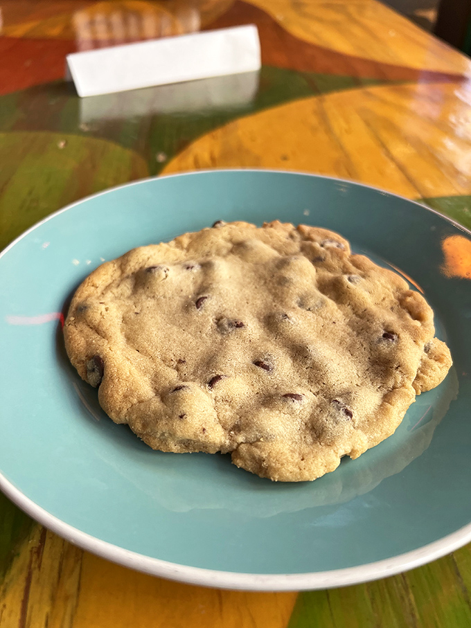 Chocolate chip cookies the size of small planets – crisp edges, chewy centers, and enough chocolate to make you temporarily forget about the pizza.