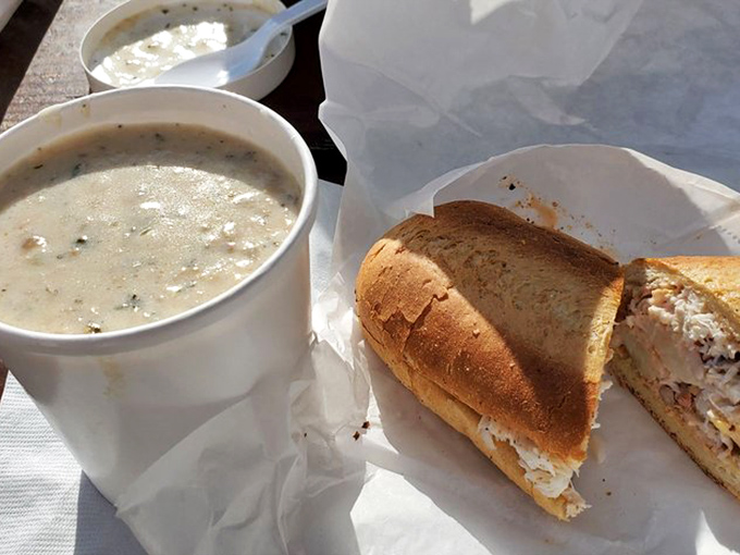 A cup of their legendary clam chowder alongside a crab sandwich—the coastal equivalent of winning the culinary lottery.