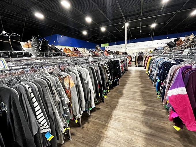 Clothing racks stretch toward the horizon like a fashionista's dream. The thrill of the hunt is real when designer labels lurk among everyday finds.