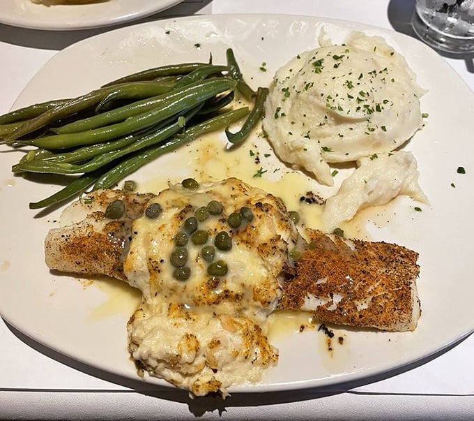 Cod Imperial – where fish gets dressed for the gala, adorned with capers and a sauce that would make butter jealous.