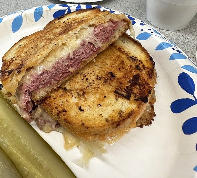 This isn't just lunch—it's edible history. The perfect ratio of corned beef to sauerkraut creates a sandwich symphony that Mozart would envy.