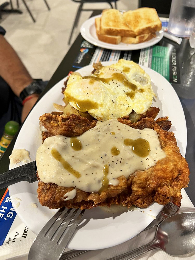 Country fried steak that's crispy on the outside, tender within, and blanketed with gravy that should have its own fan club.