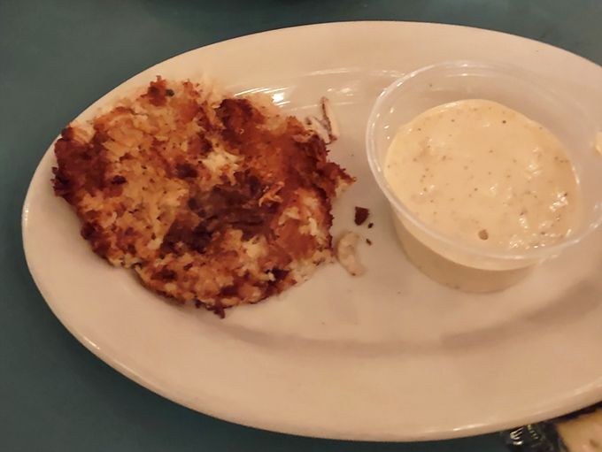 Golden-brown on the outside, tender within – this crab cake with its side of creamy sauce proves Scotti's seafood game is as strong as its pizza.