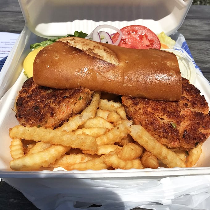 Crab cakes and fries – the comfort food of coastal dreams. These golden-brown discs of crabby goodness make you wonder why you'd ever waste time with lesser versions.