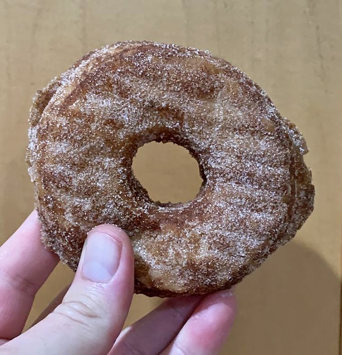 The cinnamon sugar cronut – where donut meets croissant in a marriage so perfect it should have its own reality show.