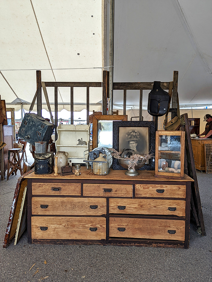This isn't just a dresser; it's a time machine with drawers. The vintage photographs add the perfect touch of nostalgia.