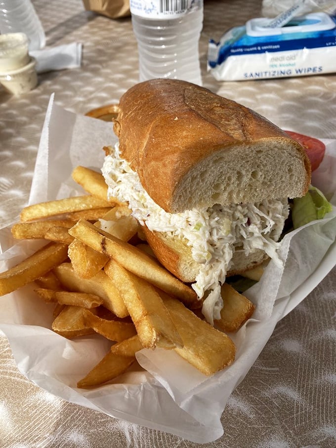 A Dungeness crab sandwich that makes you wonder why you ever settled for tuna – paired with fries that deserve equal billing.