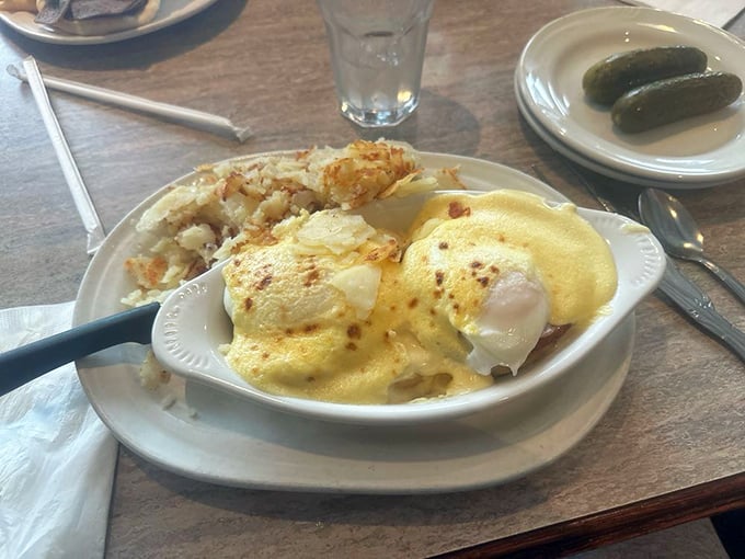 Eggs Benedict that would make a brunch snob weep with joy. That hollandaise sauce isn't just poured—it's practically performing a love sonnet.