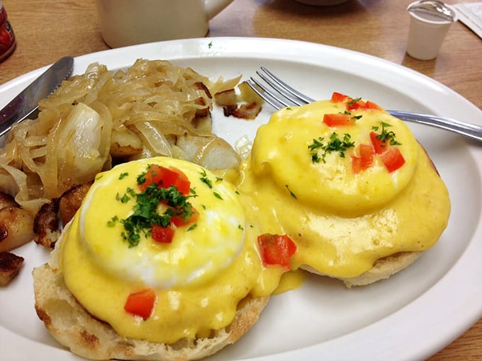 Eggs Benedict that would make the snobbiest brunch enthusiast nod in approval—golden hollandaise cascading over perfectly poached eggs like a breakfast waterfall.