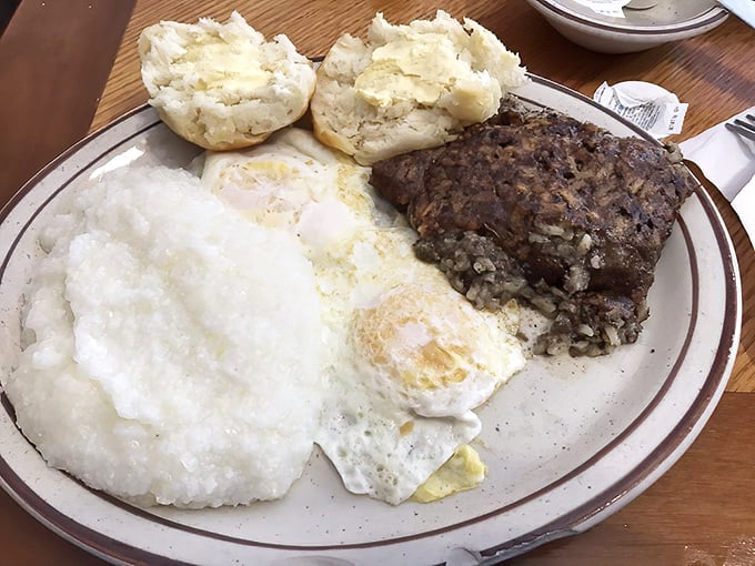 Grits as smooth as Southern charm, eggs with perfect sunny centers, and biscuits that could make your grandma jealous. Breakfast trifecta achieved!