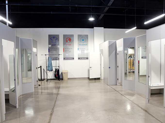 Modern fitting rooms with clean lines and ample space—because finding vintage treasures shouldn't mean enduring vintage changing facilities.