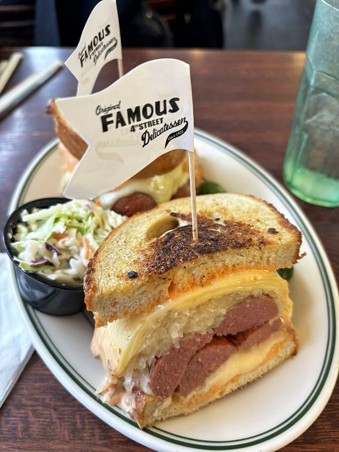The Reuben reimagined—where sauerkraut, melted cheese, and perfectly grilled bread create a symphony that would make even Mozart put down his fork in awe.