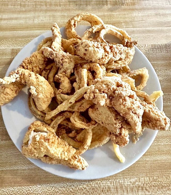 Behold the golden archipelago of fried goodness! These crispy morsels are what food dreams are made of—simple, perfect, and utterly irresistible.