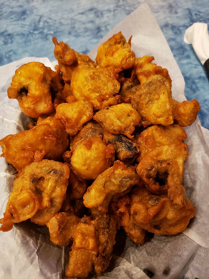 These beer-battered mushrooms aren't just fried—they're transformed into little flavor bombs that explode with earthy goodness in every bite.