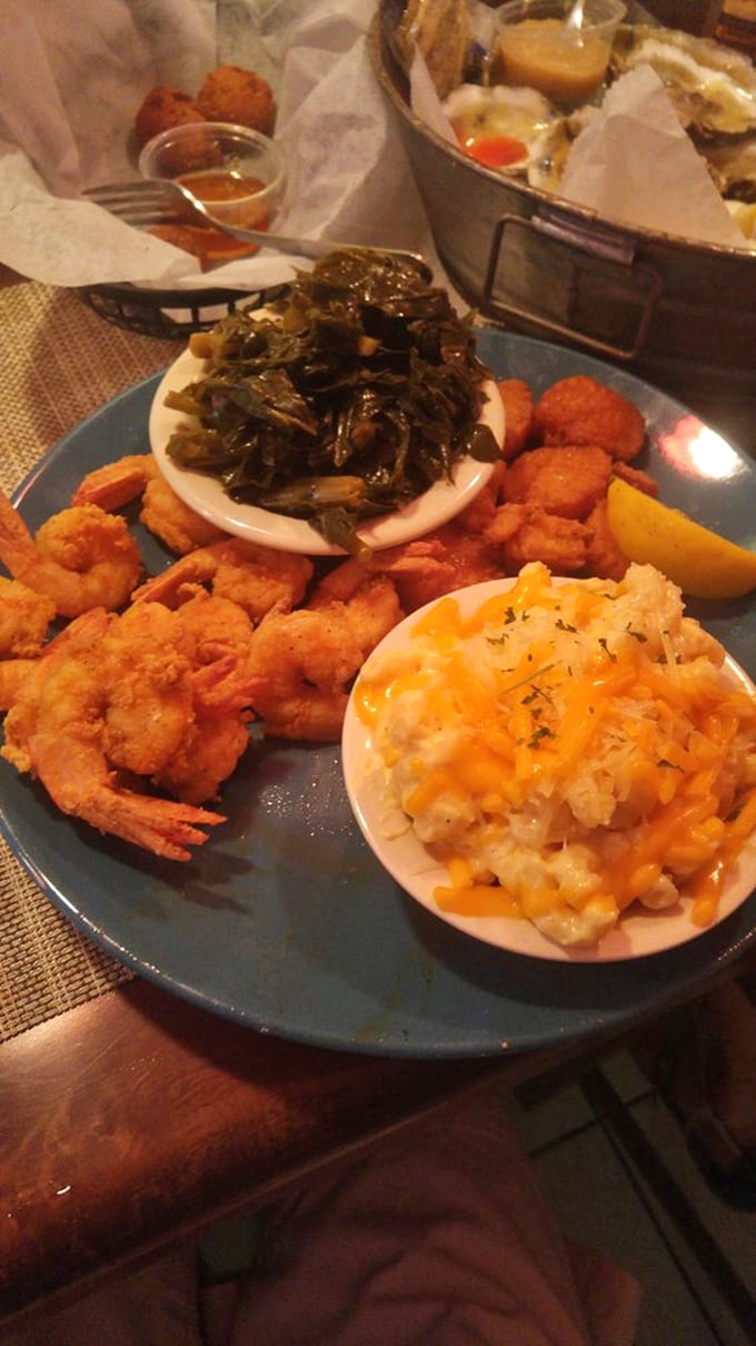 A seafood trifecta: plump fried shrimp, cheese-laden mac, and collards cooked with respect. This plate is the Low Country's greatest hits album.