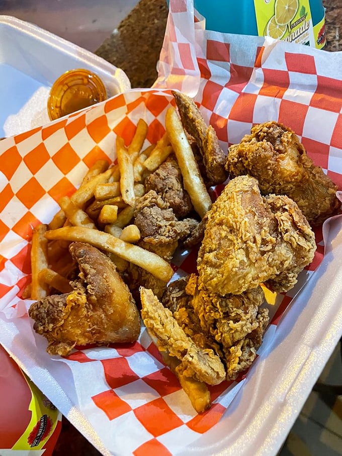 Behold the Harold's money shot—perfectly fried chicken and fries with that signature sauce drizzle. Poetry doesn't always rhyme; sometimes it crunches.