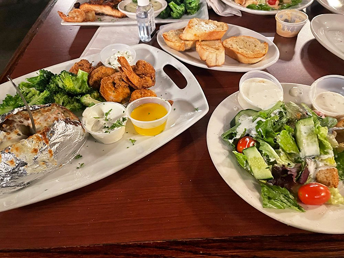 A plate that understands balance: crispy golden shrimp, garden-fresh broccoli, and a baked potato waiting for its butter bath. Comfort food with dignity.