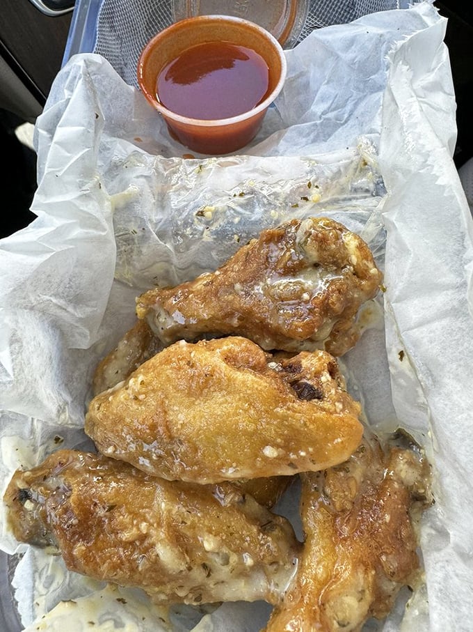 These wings aren't just playing backup to the cheesesteaks; they're scene-stealers with their glistening sauce and perfect crisp-to-juicy ratio.