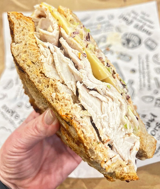 The Georgia Reuben swaps turkey for corned beef, coleslaw for sauerkraut, and still manages to maintain its sandwich citizenship with flying colors.