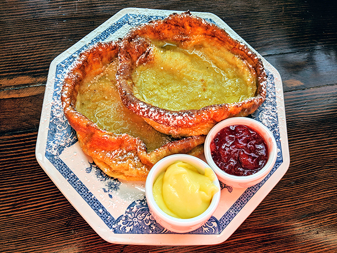 German pancakes puff up like edible clouds, served with jam and mustard—a sweet-savory combination that'll make you question everything you thought you knew about breakfast.