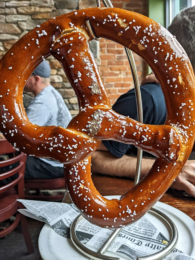 This isn't just any pretzel—it's the Goliath of beer companions, perfectly salted and practically begging for a mustard sidekick.