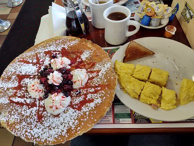The Triple Berry pancake isn't just big – it's the breakfast equivalent of Pennsylvania's rolling hills, vast and gloriously dotted with fruity treasures.
