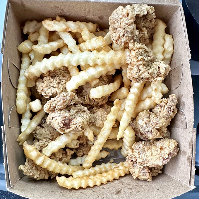 Chicken gizzards and fries—the dish that separates the culinary tourists from the true food adventurers.