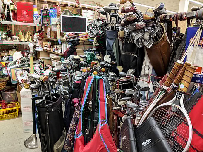 Golf clubs galore, enough to outfit an entire country club. That perfect putter you've been dreaming about is hiding somewhere in this magnificent mess.