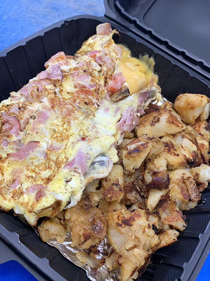 Breakfast doesn't apologize for its indulgence here—a ham-studded omelet cozies up to home fries that had a previous life as actual potatoes.