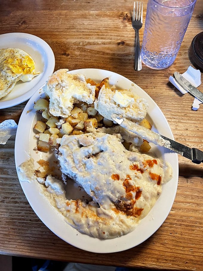 Biscuits and gravy that would make your Southern grandmother weep with joy, then immediately demand the recipe while pretending she's not impressed.