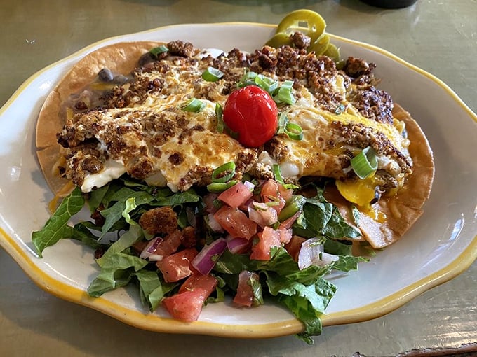 A breakfast fiesta on a plate. Those tortillas are just platforms for the real stars—perfectly fried eggs and vibrant pico de gallo.