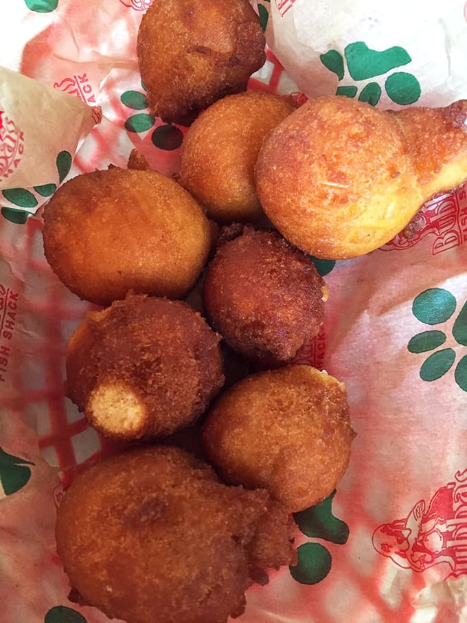 Hushpuppies so perfectly golden they deserve their own trophy case—crispy outside, tender inside, and worth every single calorie.