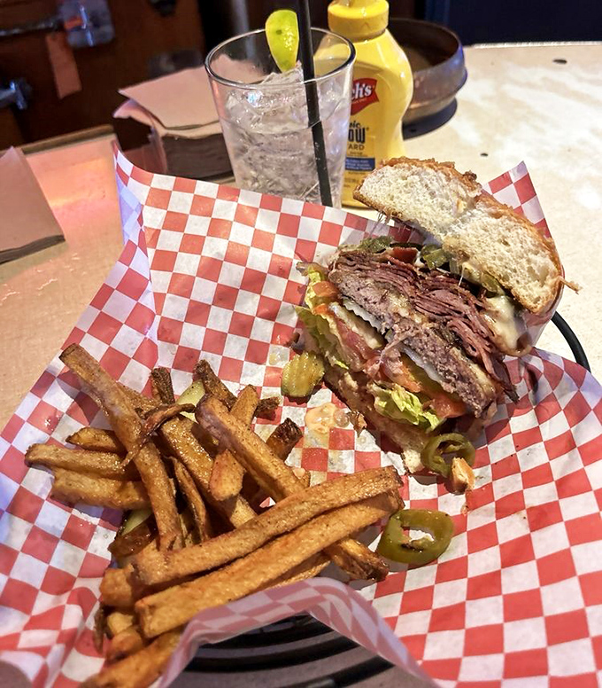 Not just breakfast! This towering sandwich with golden fries proves Mock Crest knows its way around lunch too – comfort food elevated.