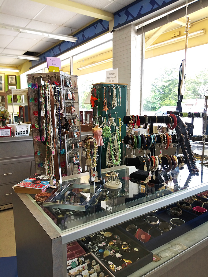 The jewelry counter gleams with possibilities—each necklace, bracelet, and earring whispering tales of formal dinners and special occasions past.