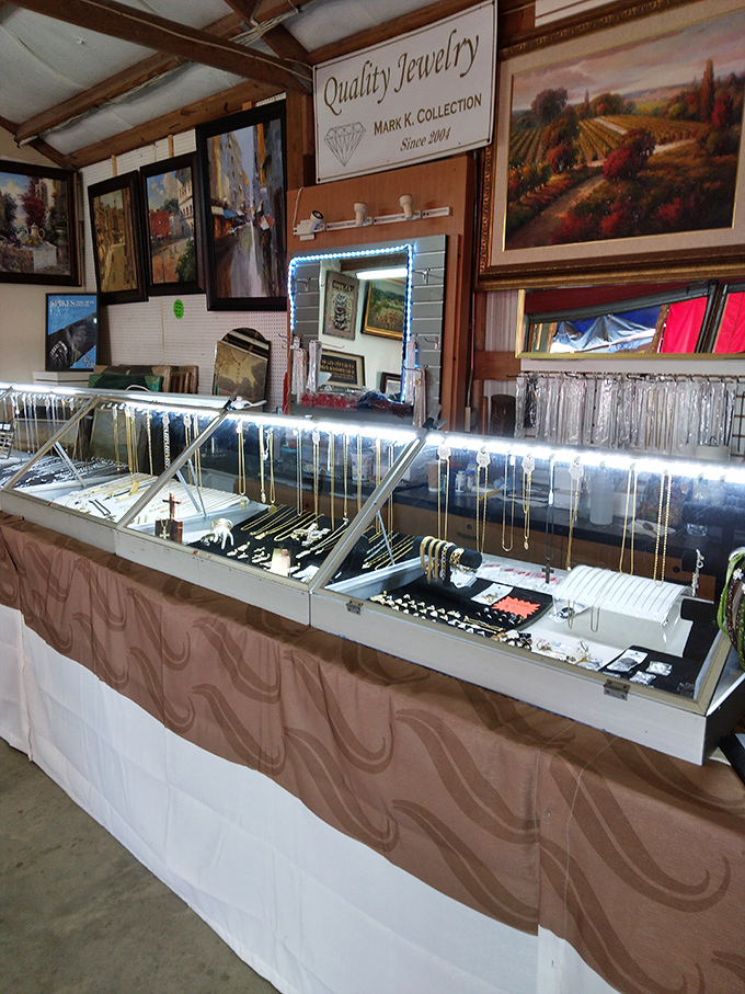 All that glitters is displayed under "Quality Jewelry" at this booth. Treasures for every taste line these illuminated cases.