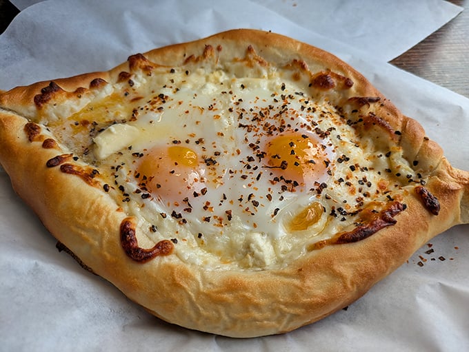 Bread boats shouldn't be this exciting, but when they're filled with cheese and crowned with perfectly cooked eggs, suddenly you're all aboard.
