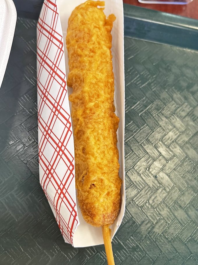 The Krunch Pup—where hot dog meets fish and chips philosophy. This batter-dipped delight on a stick proves everything is better when it's wearing a golden crispy coat.