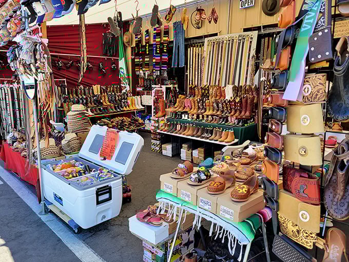 Cowboy boot heaven meets leather goods paradise. This stall could outfit a Western movie cast with enough authentic gear left over for the sequel.