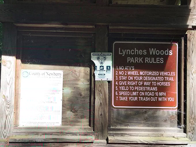 Lynch's Woods Park rules read like small-town poetry: no ATVs, yield to horses, and take your trash with you—civilization distilled to its essentials.