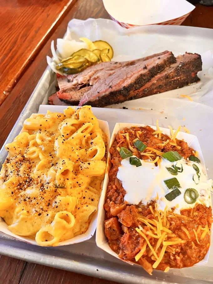 Mac and cheese that doesn't apologize for being exactly what it is—gloriously rich, unapologetically yellow, and ready to complement that brisket.