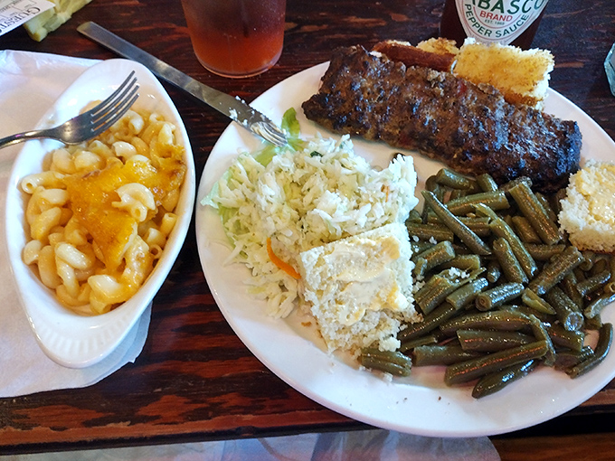 That glossy red sauce blanket on the meatloaf isn't just for show—it's the finishing touch on a dish worth rescheduling your life around.