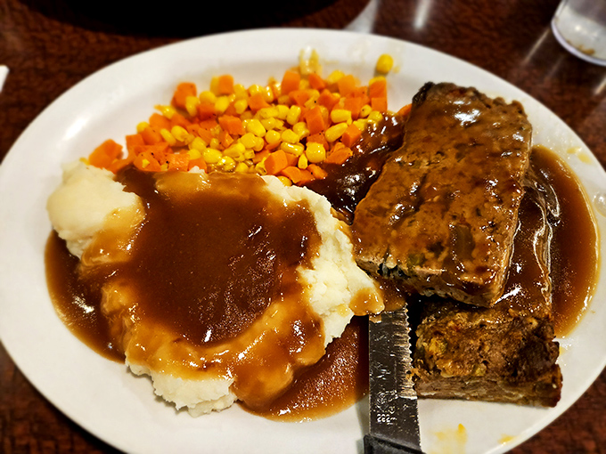 This isn't just meatloaf – it's edible nostalgia served on white plates, where every bite tastes like someone's grandmother is in the kitchen.