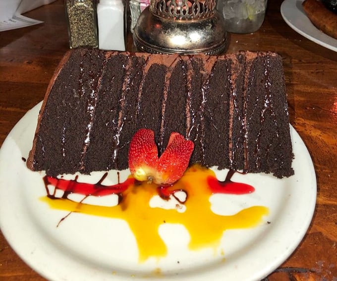 Nine layers of chocolate cake that could make a grown cowboy weep tears of pure, unadulterated joy.
