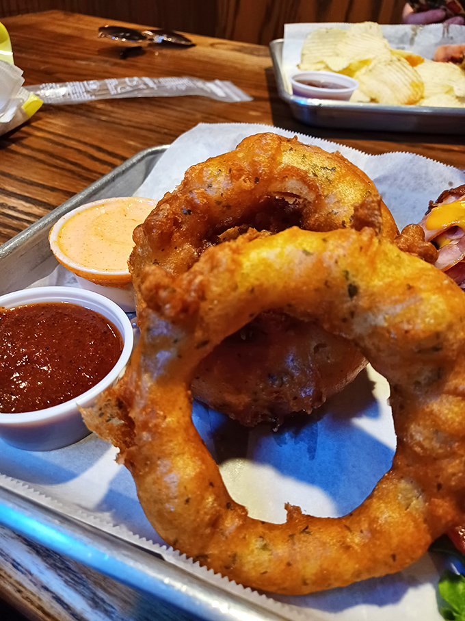The humble onion achieves its highest calling in these rings—crispy, golden halos of flavor that deserve their own fan club