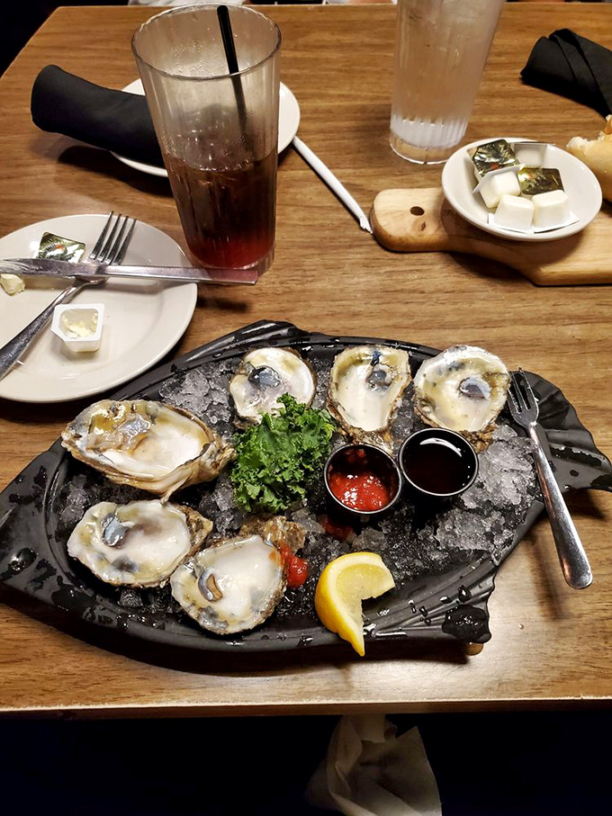 Fresh oysters on ice—nature's perfect appetizer—served with classic accompaniments and the unspoken promise that you'll order another half-dozen.