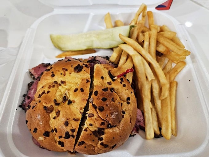 Pastrami royalty on a throne of onion roll. This sandwich doesn't just satisfy hunger – it creates memories with every succulent, peppery bite.