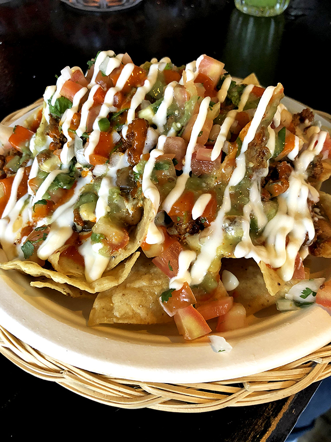Layer upon glorious layer. Like a Jackson Pollock painting you can eat, these nachos transform mess into art.