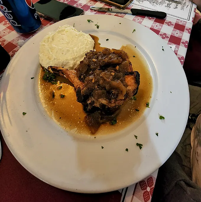 Sweet potato mash, Brussels sprouts with bacon, and a steak with scallops—proof that in rural Illinois, surf and turf isn't just coastal cuisine.