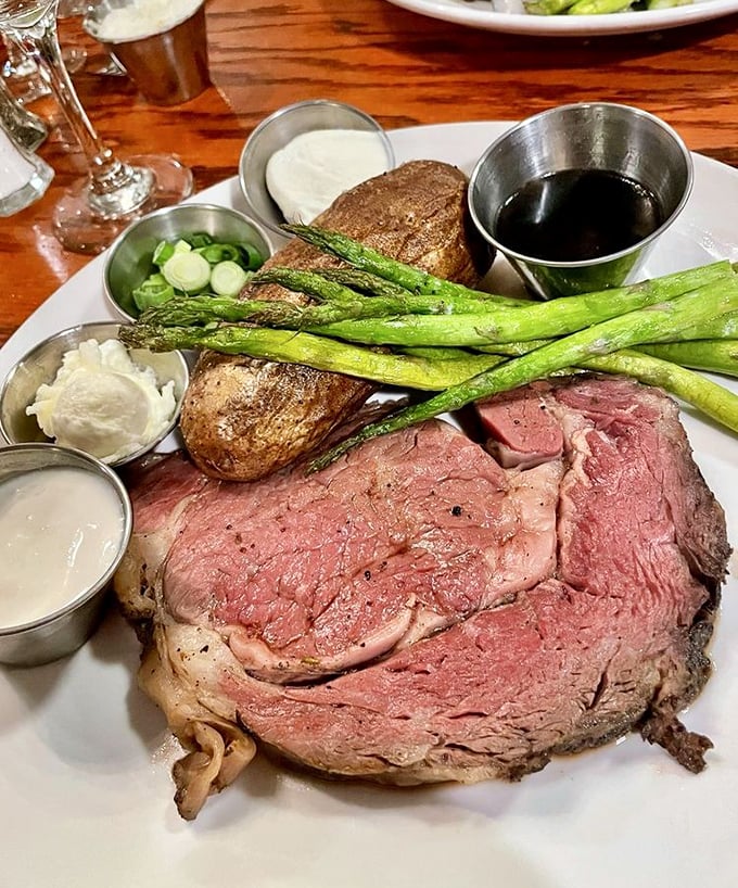 Prime rib so perfectly cooked it deserves its own Instagram account, accompanied by sides that refuse to be mere afterthoughts.