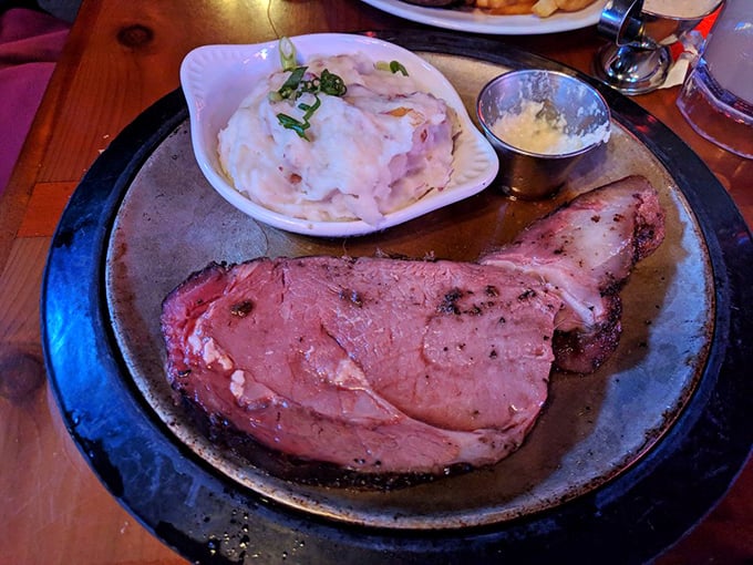 Prime rib so perfectly pink it makes flamingos jealous. That side of mashed potatoes isn't just a side—it's a supporting actor worthy of an Oscar.